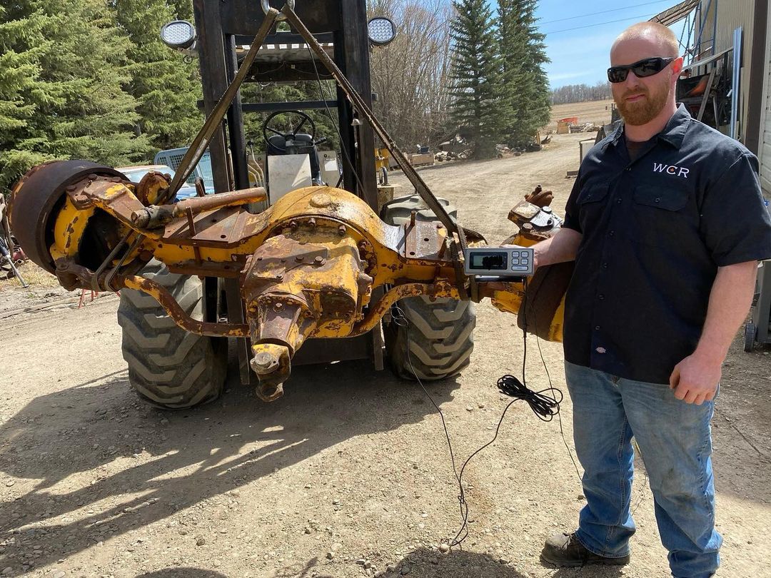Neil Harrison – WESTERN CANADIAN ROCKWELL INC